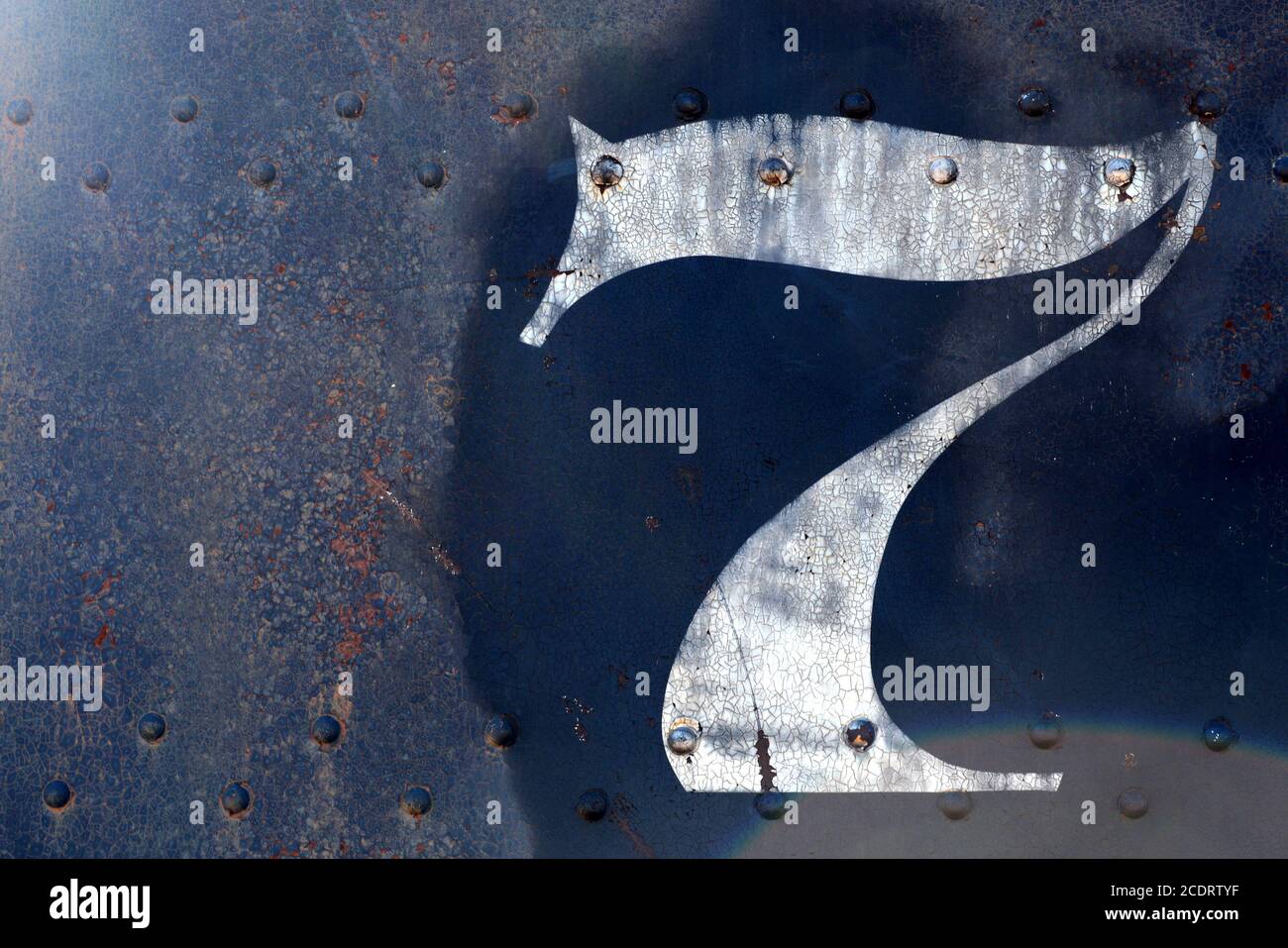 The number 7 painted on the side of a vintage railroad steam locomotive ...