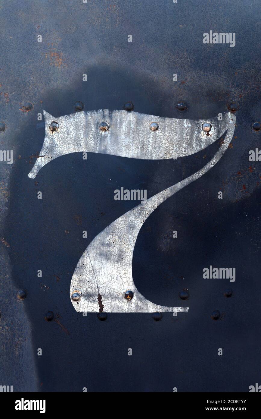 The number 7 painted on the side of a vintage railroad steam locomotive ...