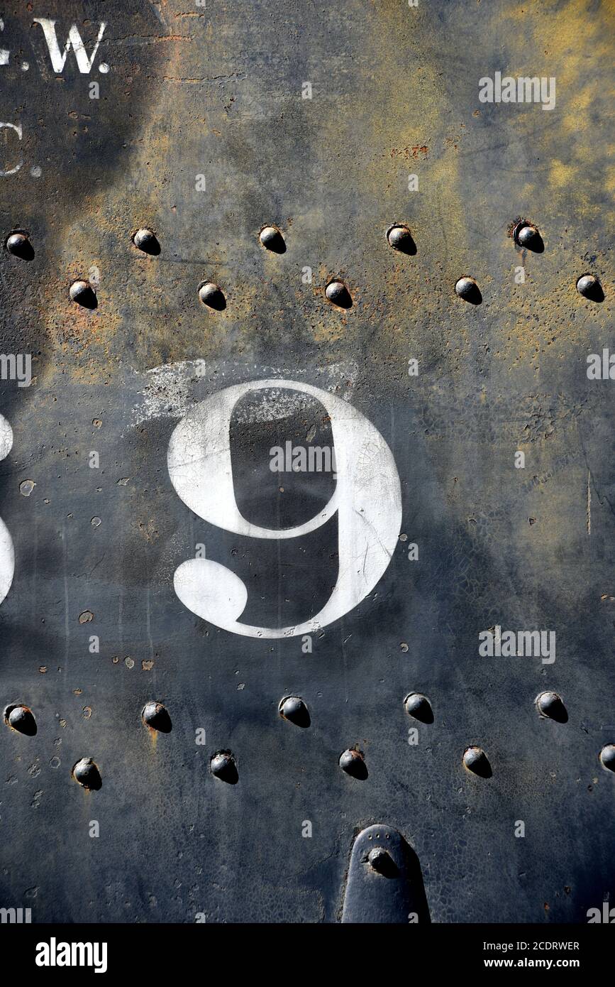 The number 9 painted on the side of an antique steam locomotive on ...