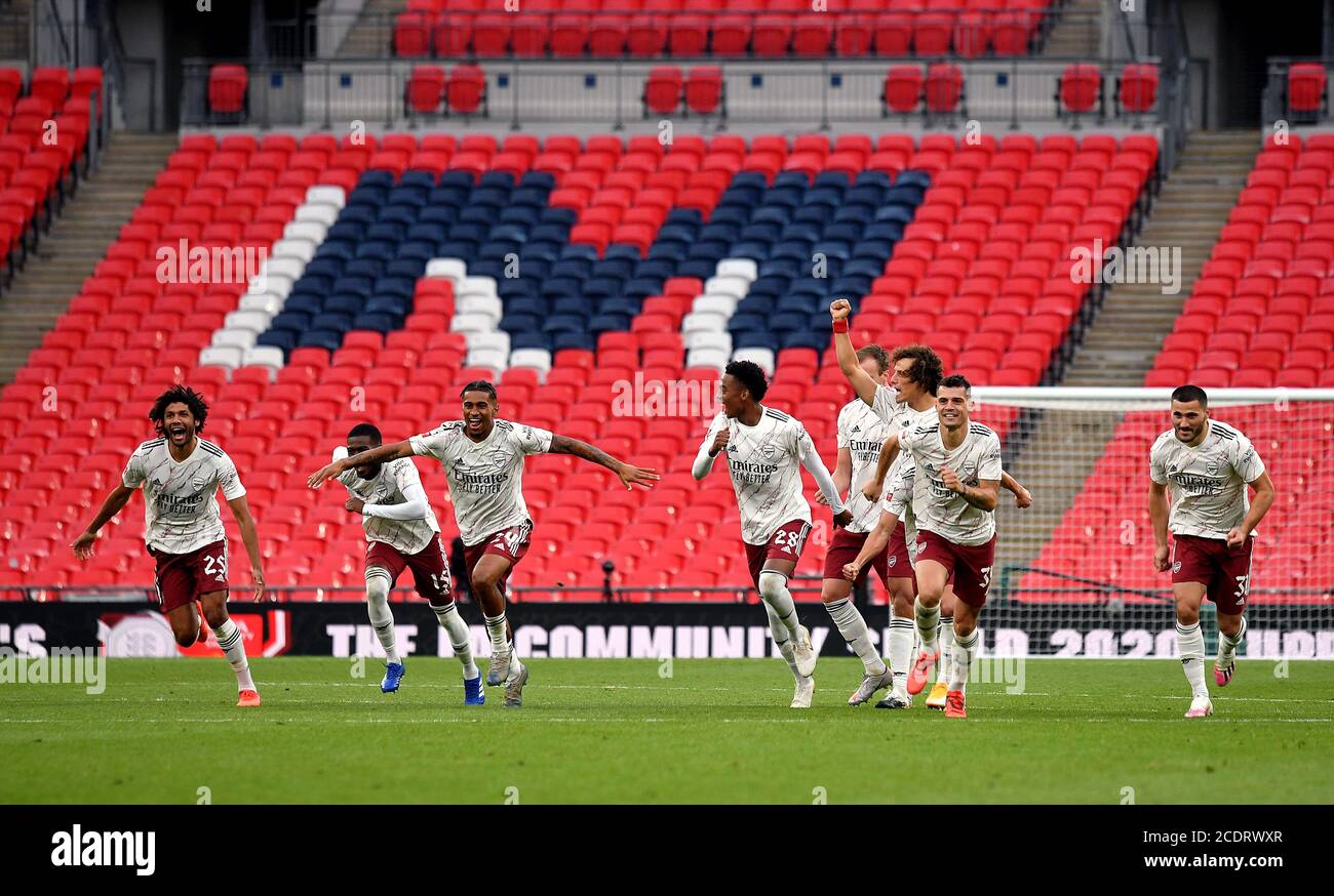 Arsenal celebrating winning the penalty shoot out to win the Community ...