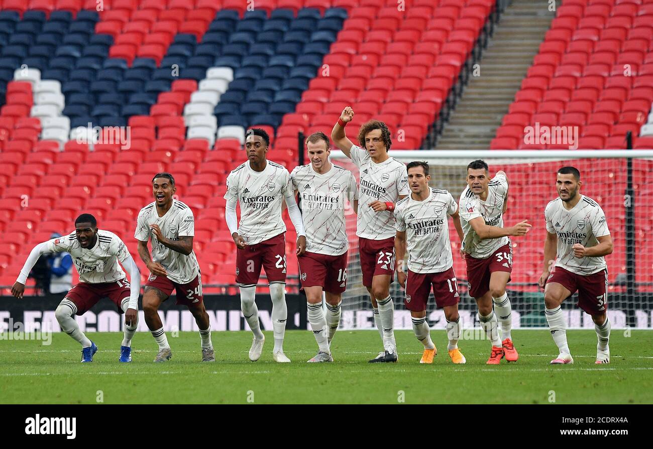 Arsenal celebrating winning the penalty shoot out to win the Community ...