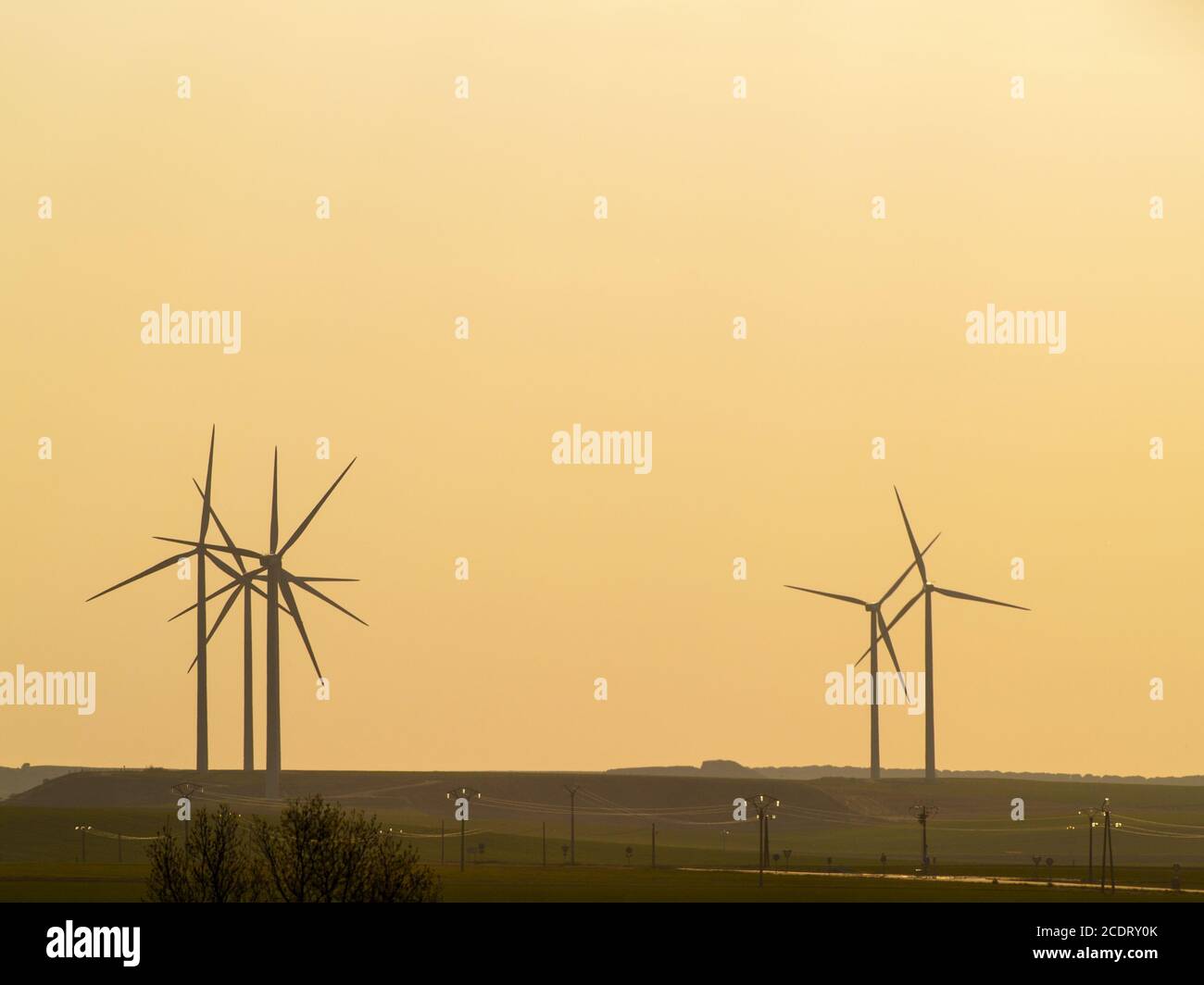 Windmill on countryside generating wind energy Stock Photo - Alamy