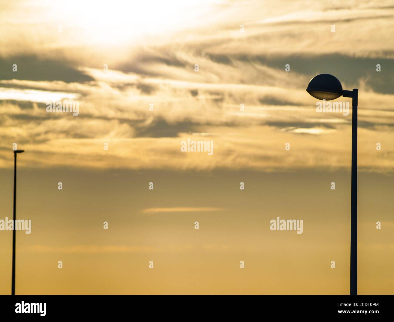 Street lights on sunset on and urban landscape Stock Photo - Alamy