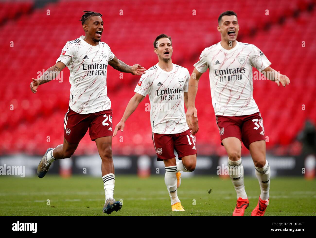 Arsenal's Reiss Nelson, Cedric Soares and Granit Xhaka celebrate ...