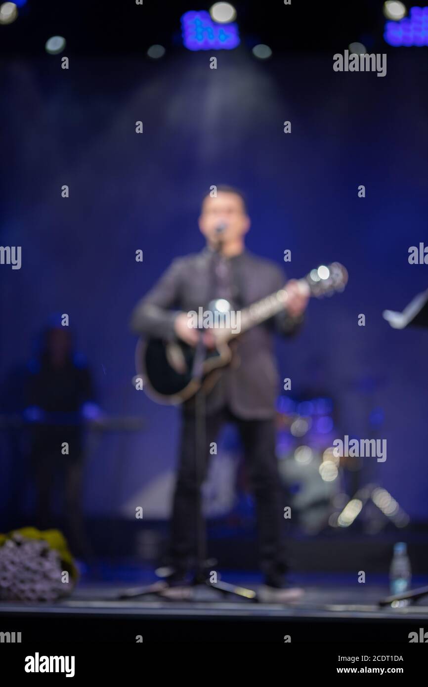 Blur defocus texture, background for design. Singers and musicians ...