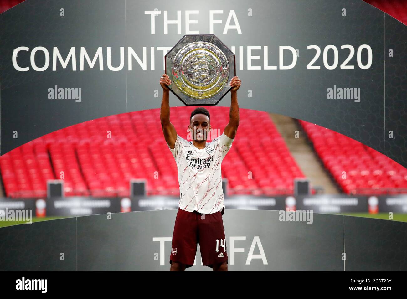 Arsenal's Pierre-Emerick Aubameyang lifts the trophy during the ...