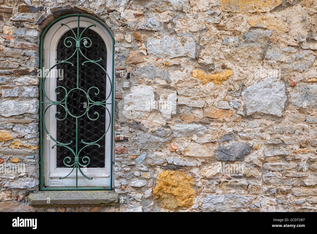 Window on an old stone wall Stock Photo - Alamy