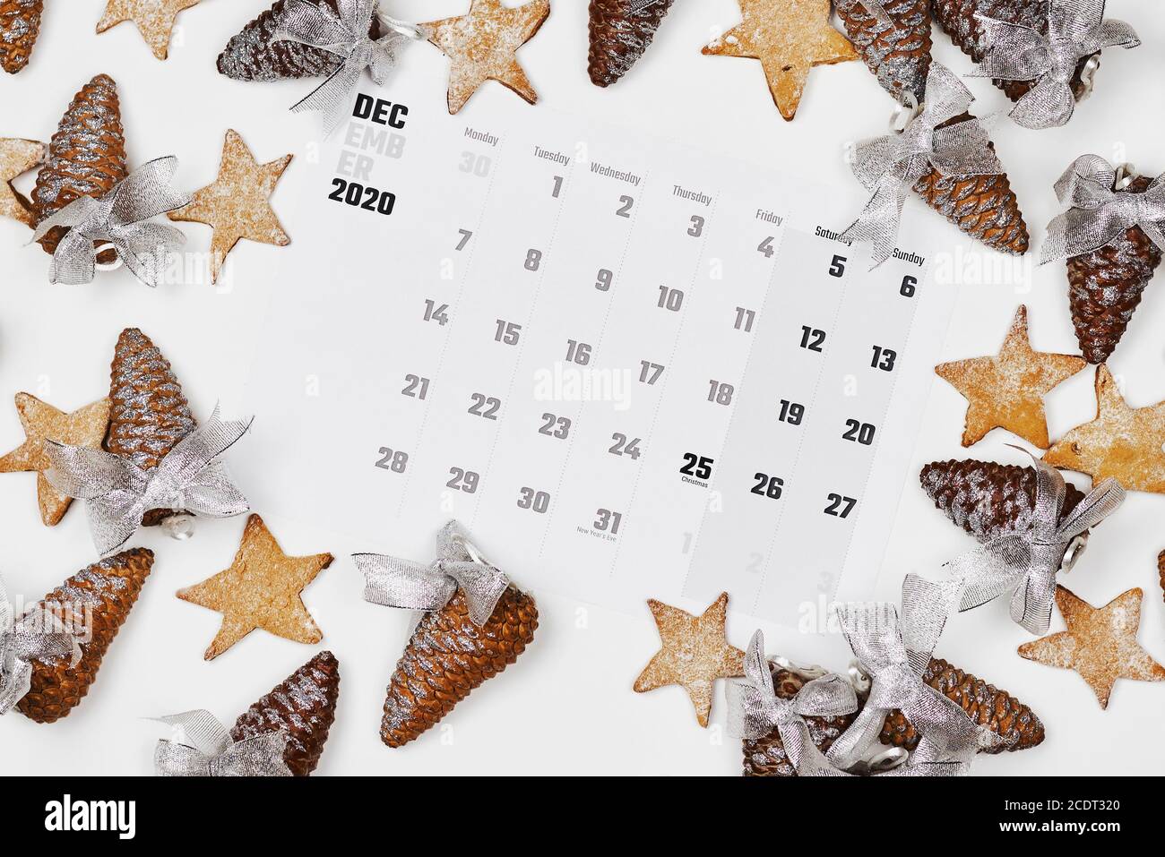 Simple December 2020 monthly calendar decorated with pine cones and ...