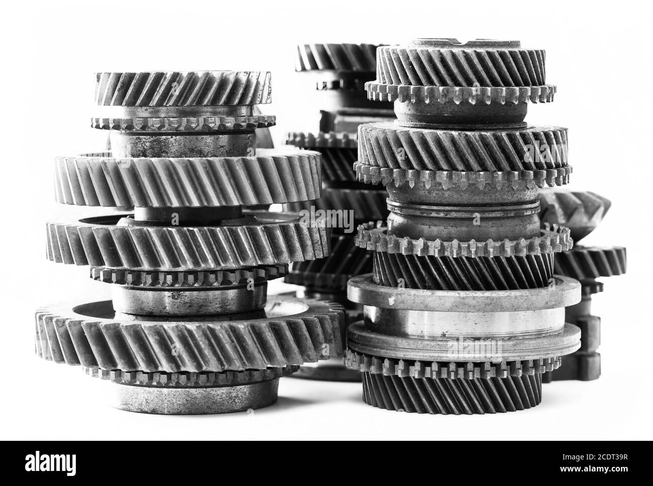 Gears, grunge cogwheels, real engine elements on white. Heavy industry ...