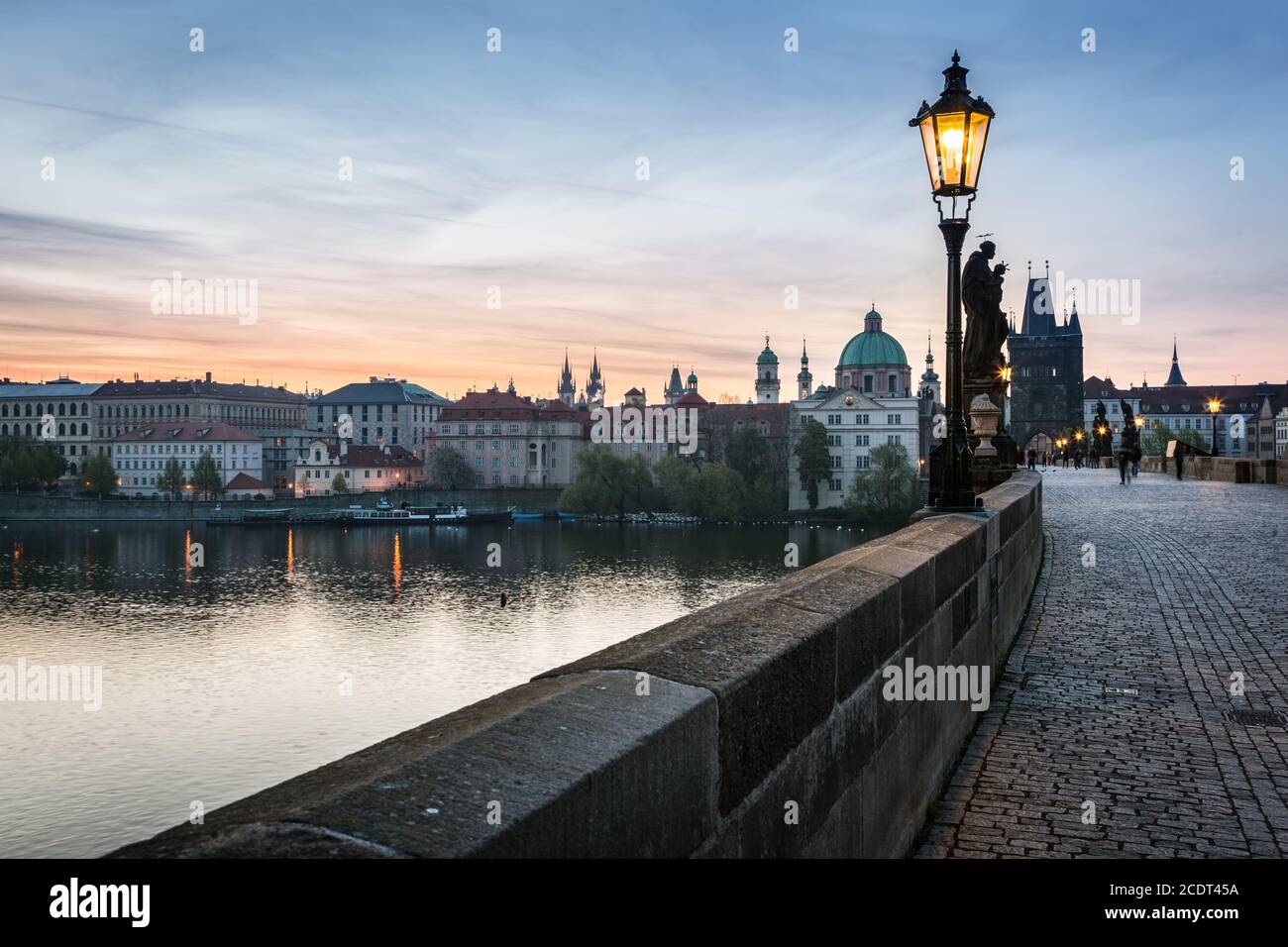 Charles Bridge at sunrise, Prague, Czech Republic. Dramatic statues and ...