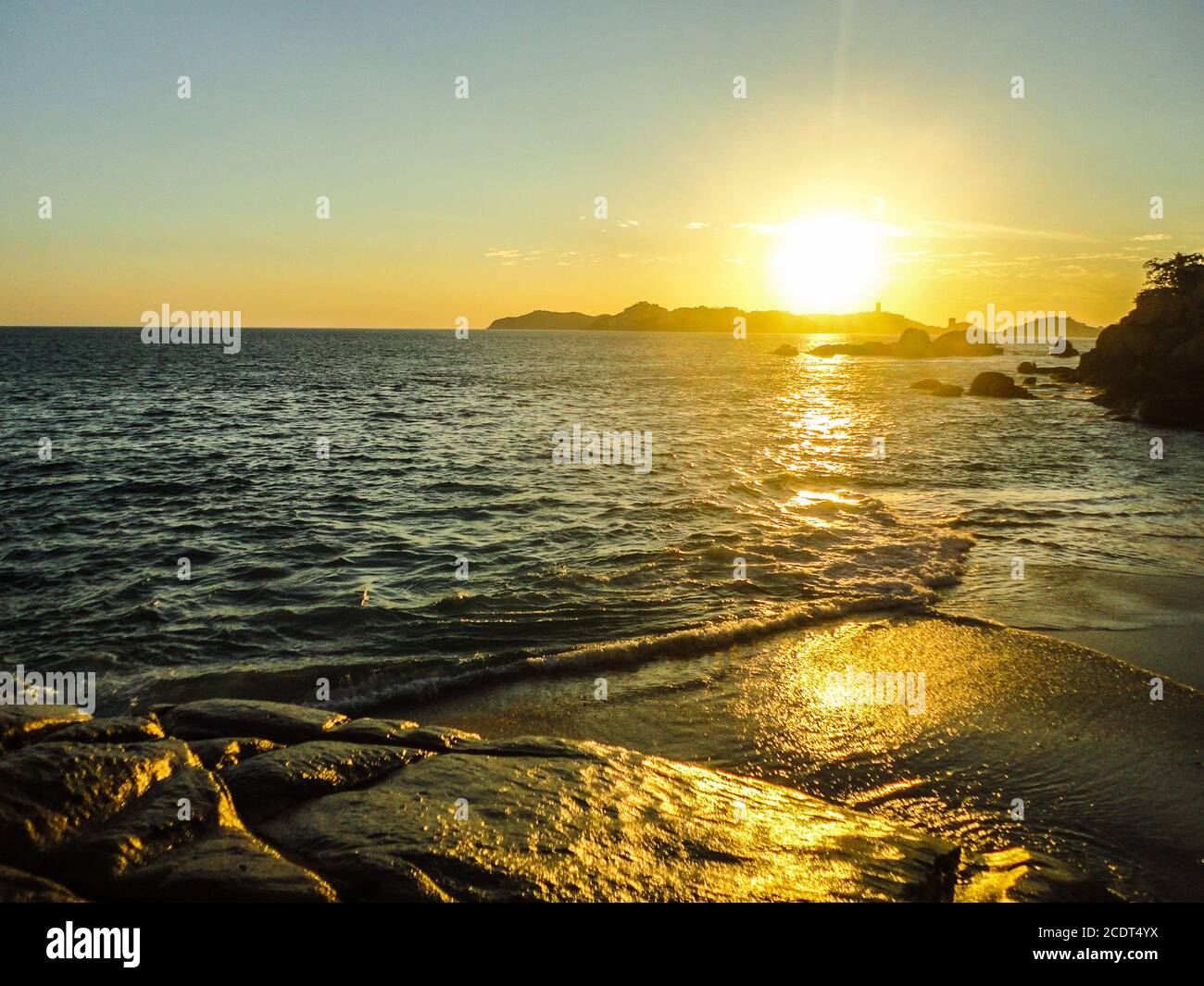 Sunset in Acapulco beaches in Mexico Stock Photo - Alamy