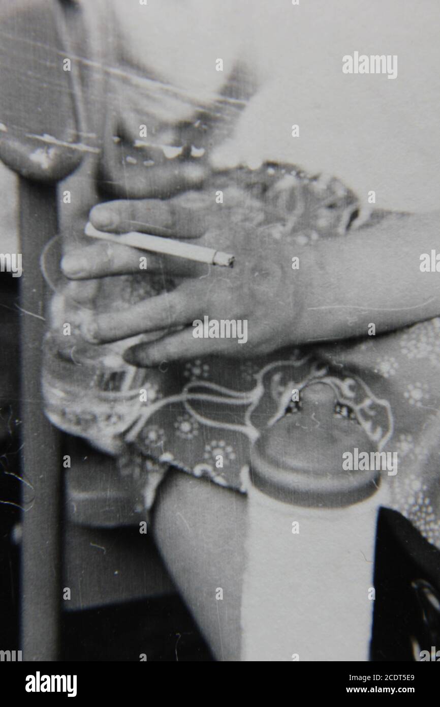 Fine 1970s vintage black and white photography of a woman smoking a ...