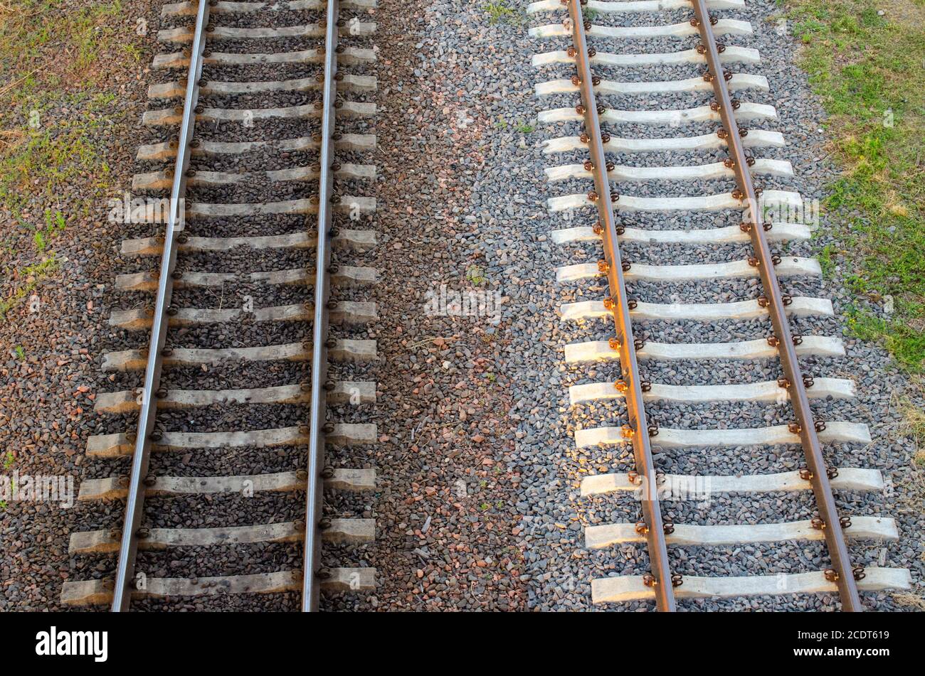 Transport security concept. Two parallel railways Stock Photo - Alamy