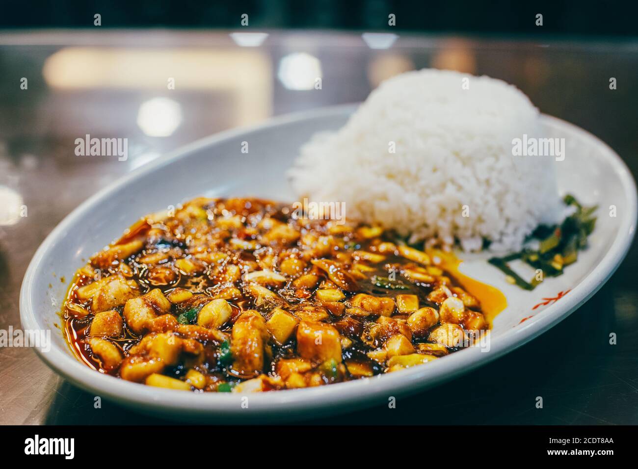 kungpao chicken rice topping in china Stock Photo - Alamy