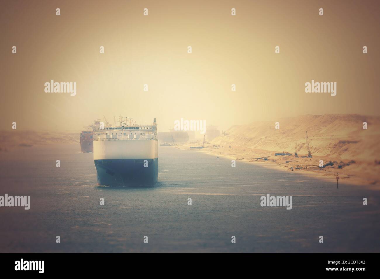 A ship passes through the suez canal hi-res stock photography and ...
