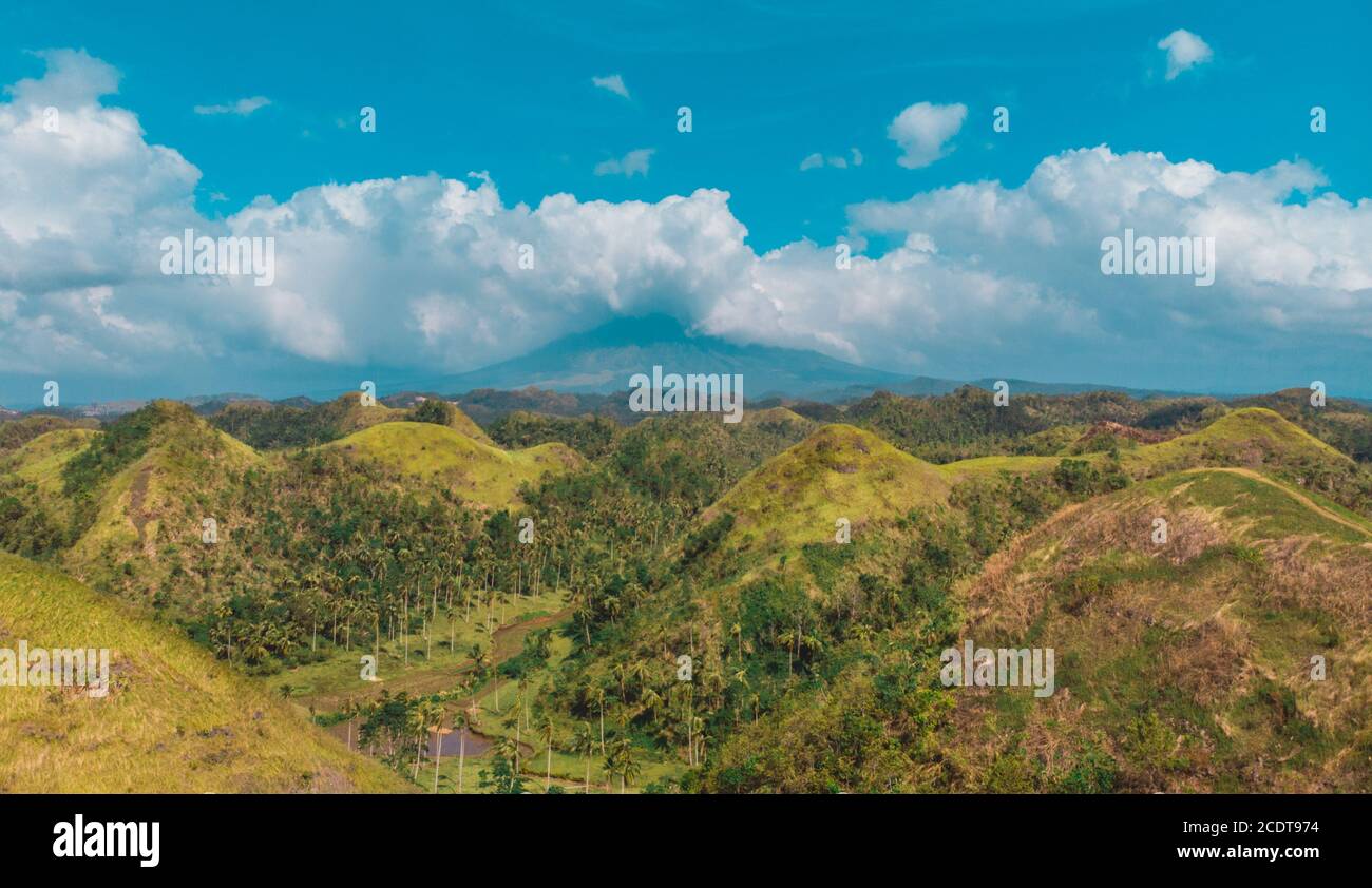 Quitinday group of hills with a view of Mt. Mayon Stock Photo - Alamy