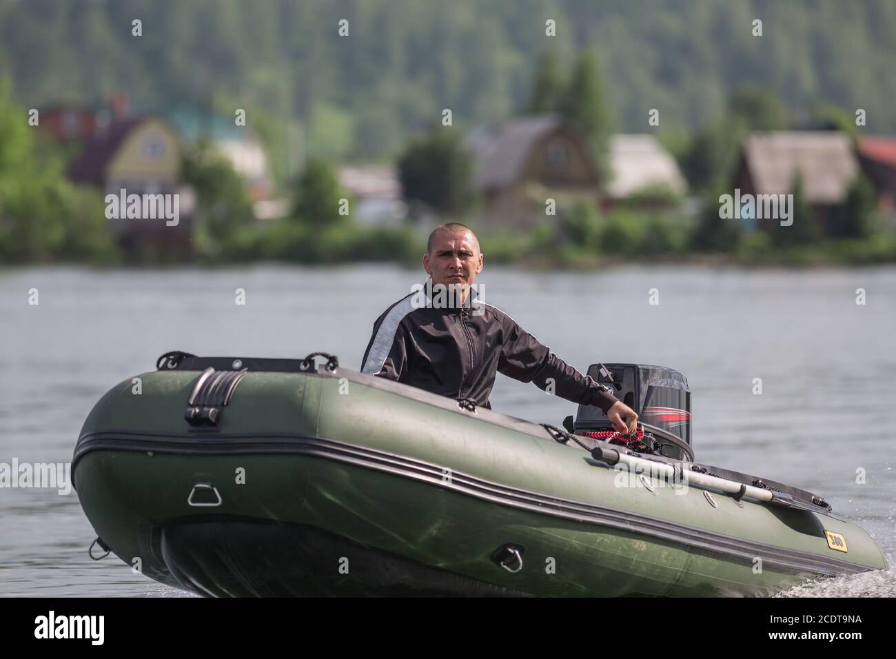 Man in boat hi-res stock photography and images - Alamy
