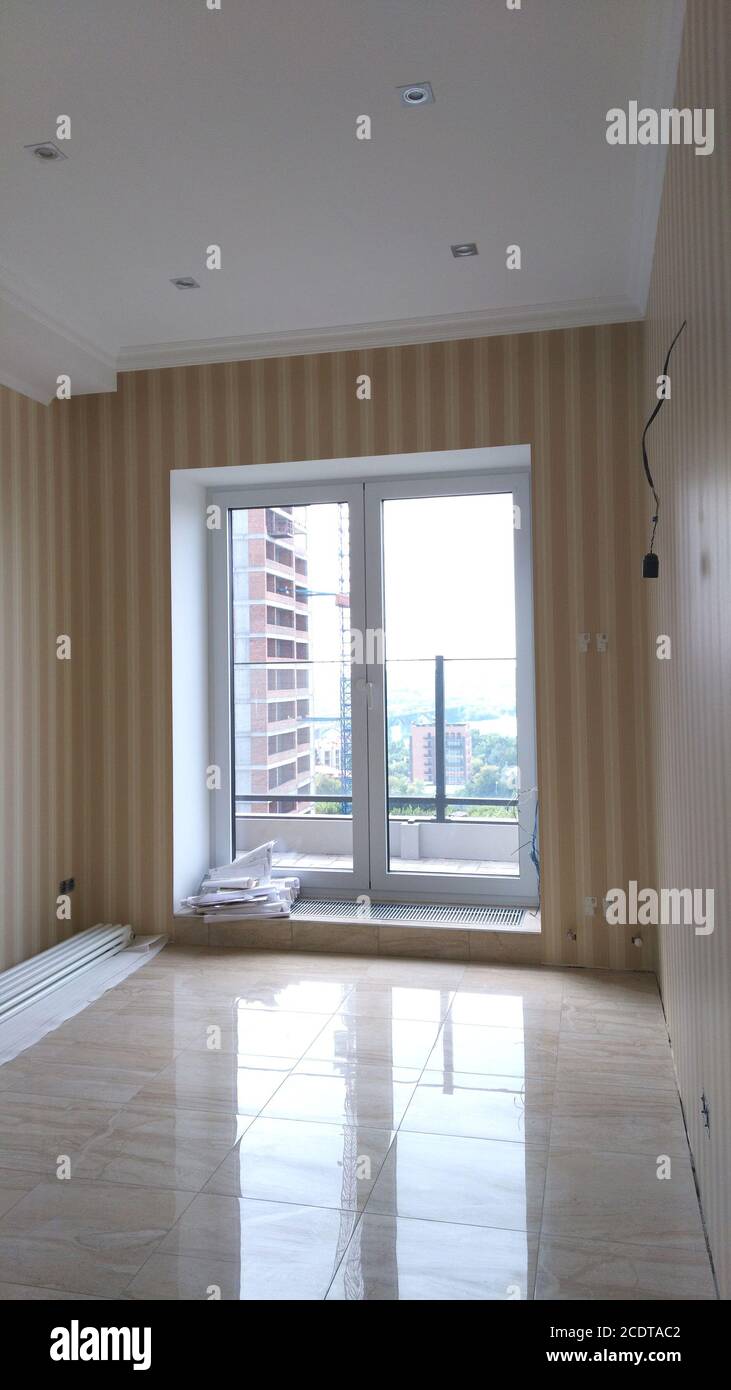 Finishing the room with a window Stock Photo - Alamy