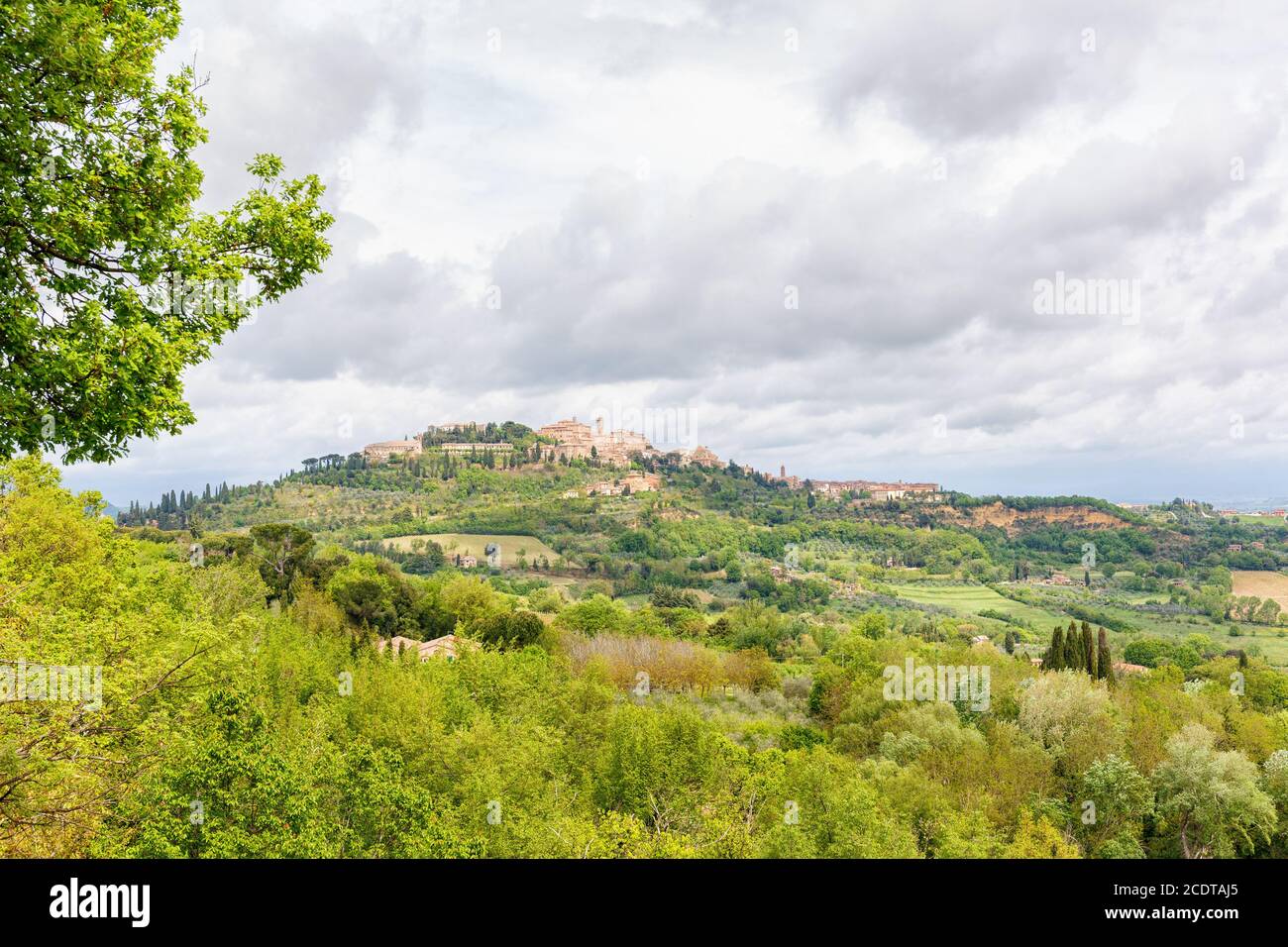 Tuscan view with an old village on a hill in the countryside Stock ...