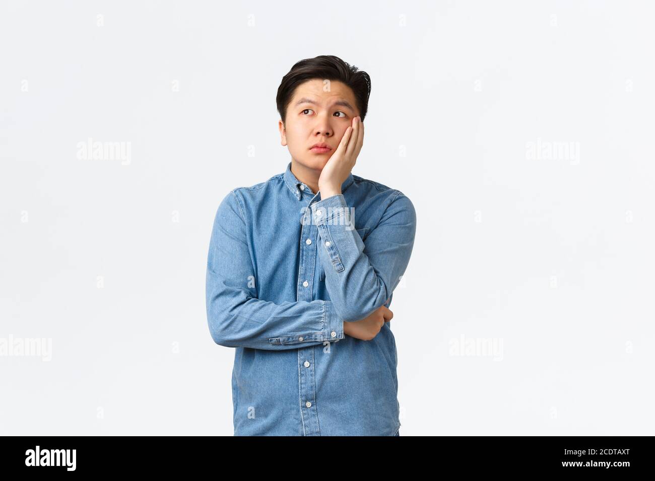 Bored and exhausted asian male student feeling unamused, space out at ...