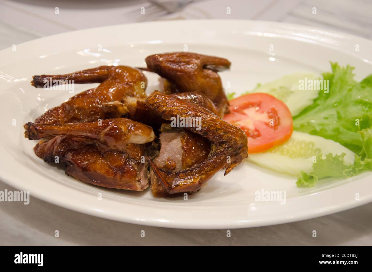Roasted pigeon hi-res stock photography and images - Alamy