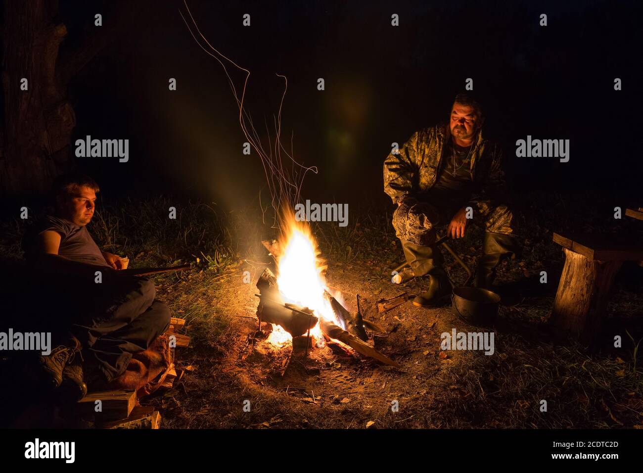 Man lighting campfire hi-res stock photography and images - Alamy
