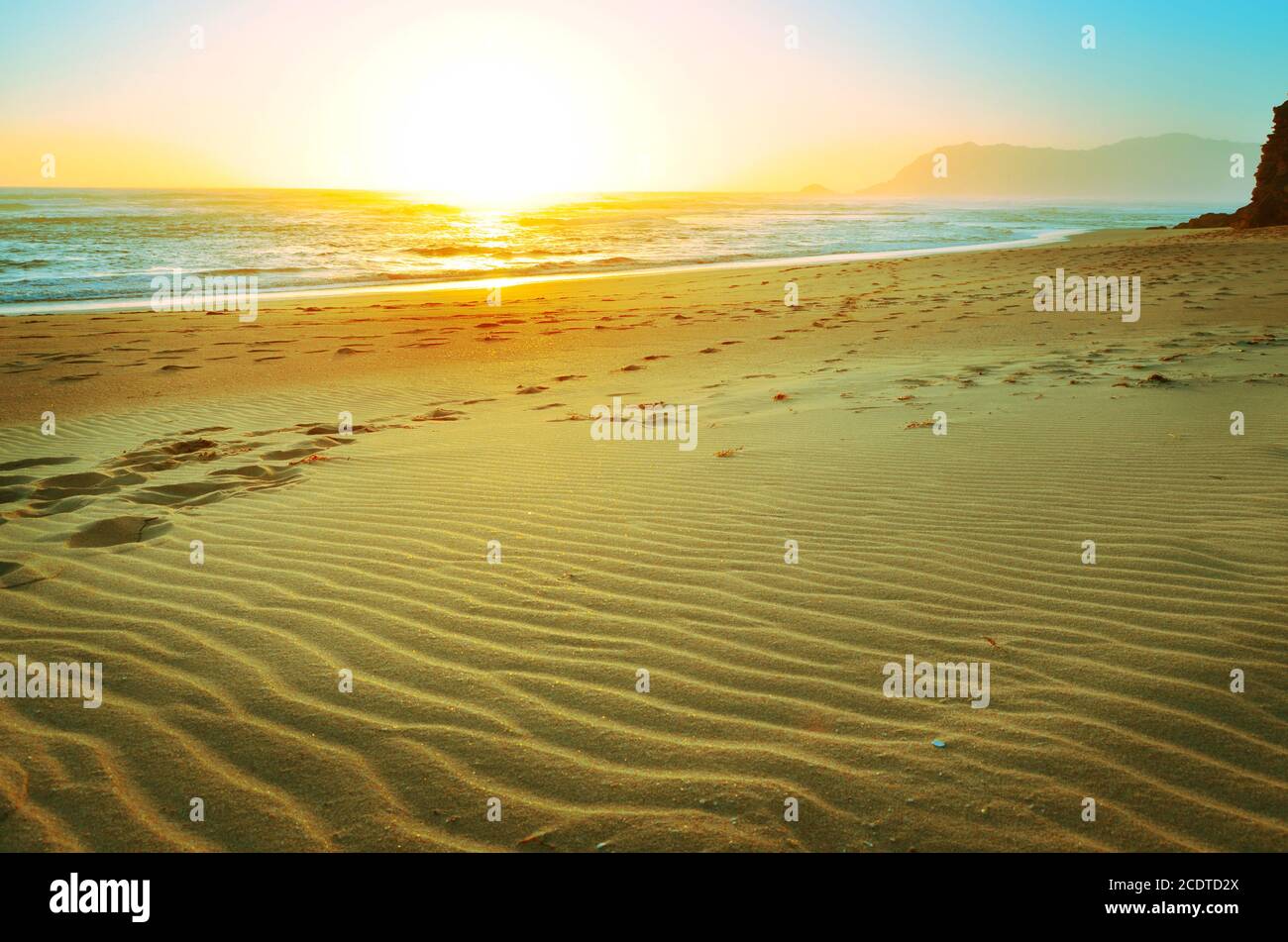 Sandy beach, tide rises Stock Photo - Alamy