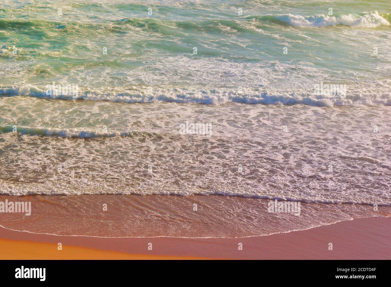 Sandy beach, tide rises Stock Photo - Alamy