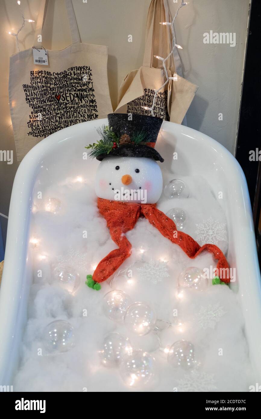 Shop display of a snowman in a bubble bath Stock Photo - Alamy
