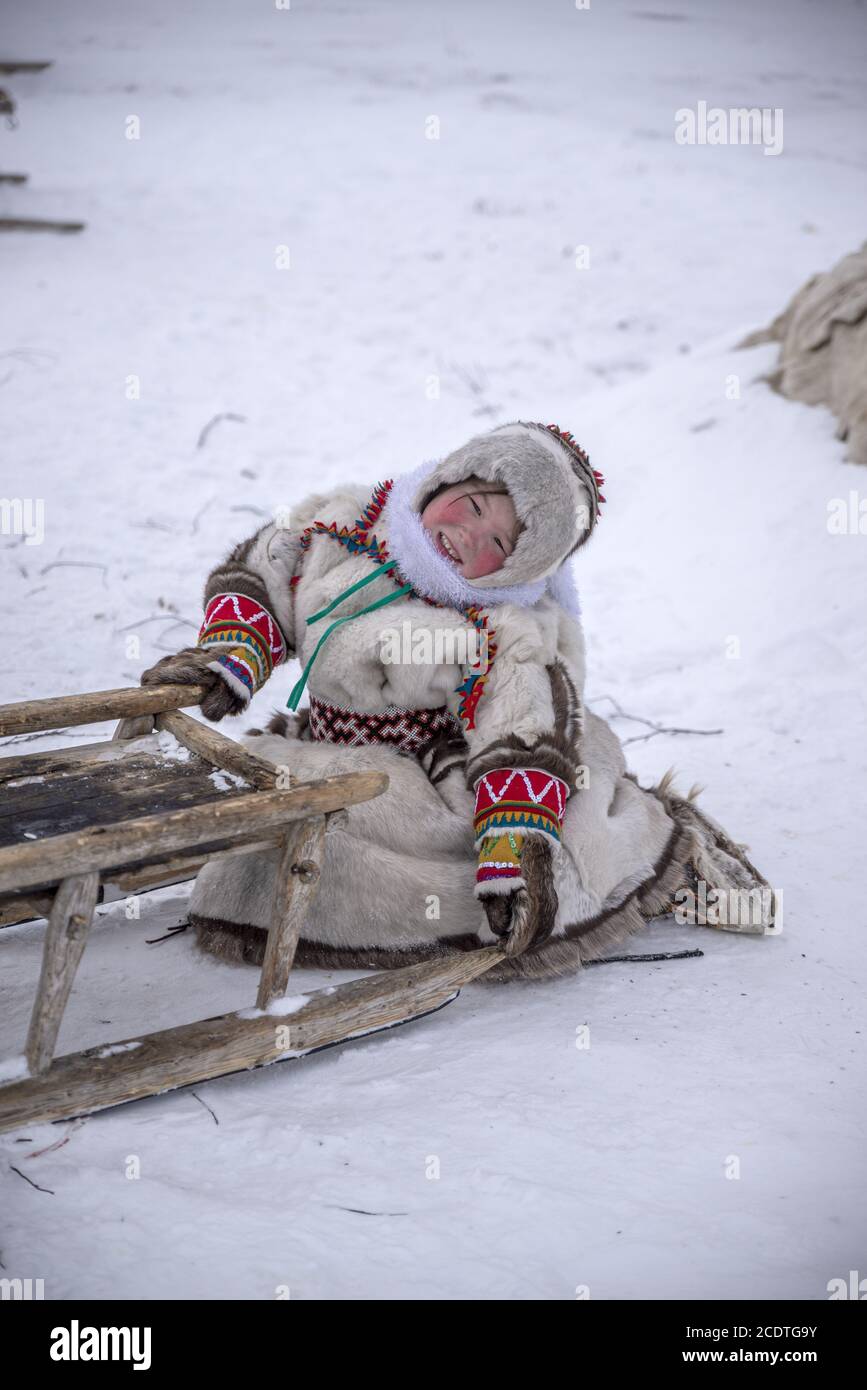 Girl and sled hi-res stock photography and images - Alamy