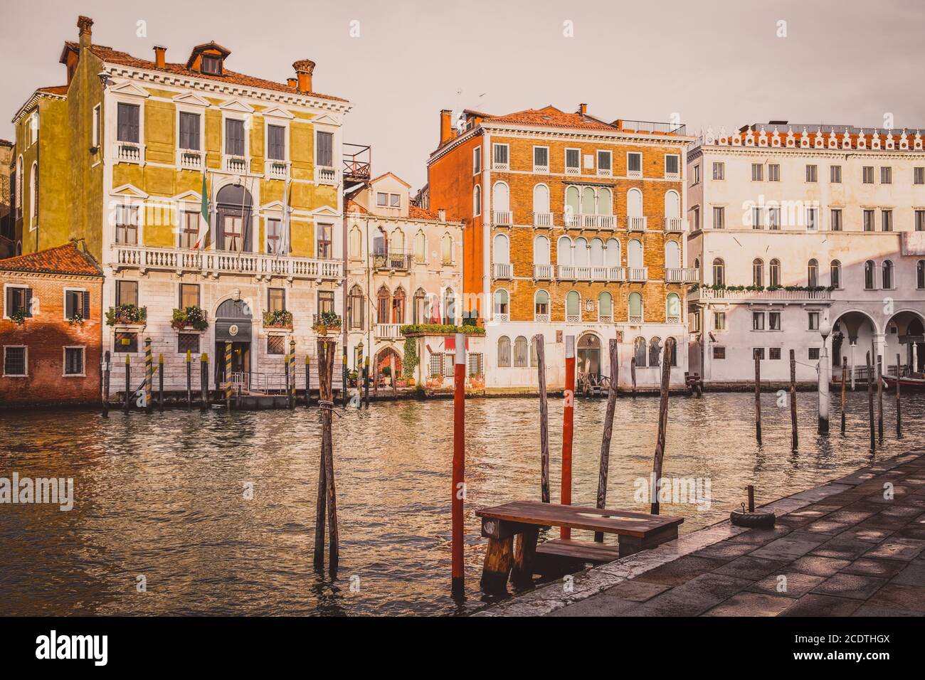 Old palaces and colorful buildings next to the Grand Canal in Venice ...