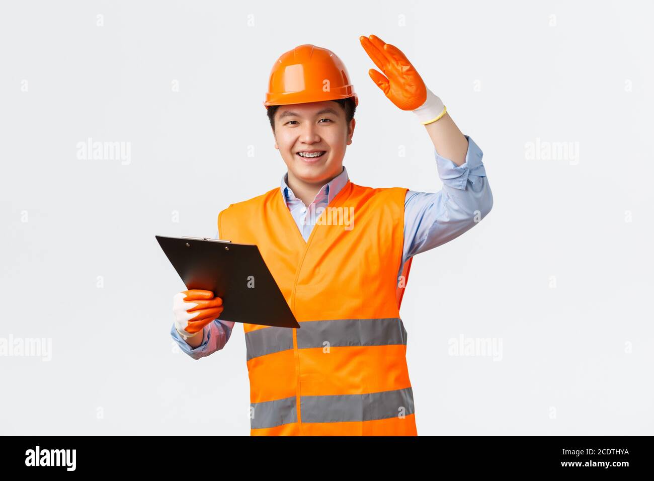 Building sector and industrial workers concept. Cheerful smiling asian ...