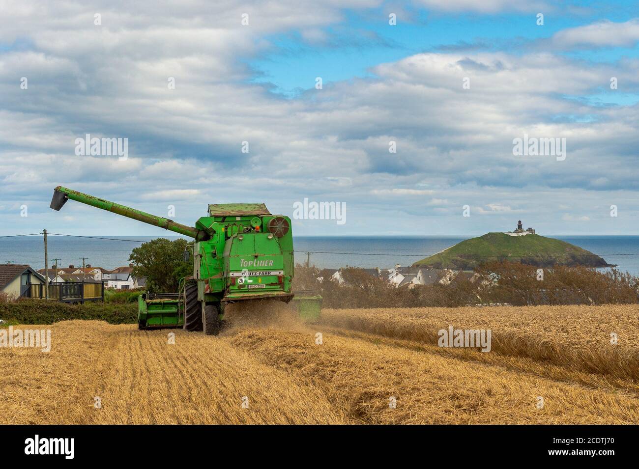 Farmer ireland combine harvester hi-res stock photography and images ...