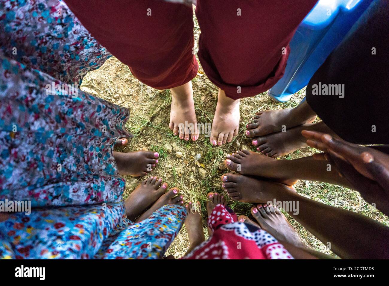 Circle of feet in black and white Stock Photo - Alamy