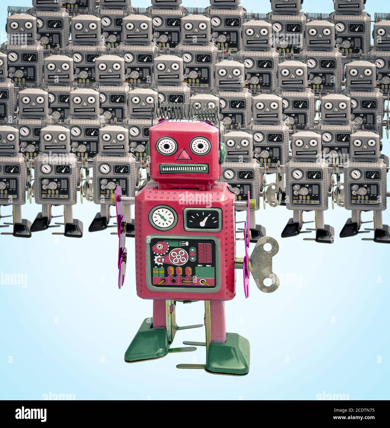 little red robot is ahead of the crowd Stock Photo - Alamy