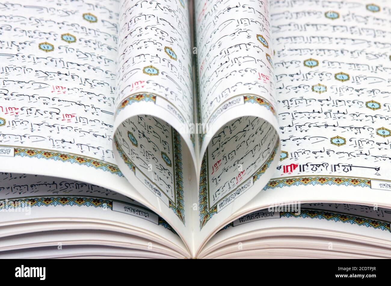 Koran book heart shape hi-res stock photography and images - Alamy