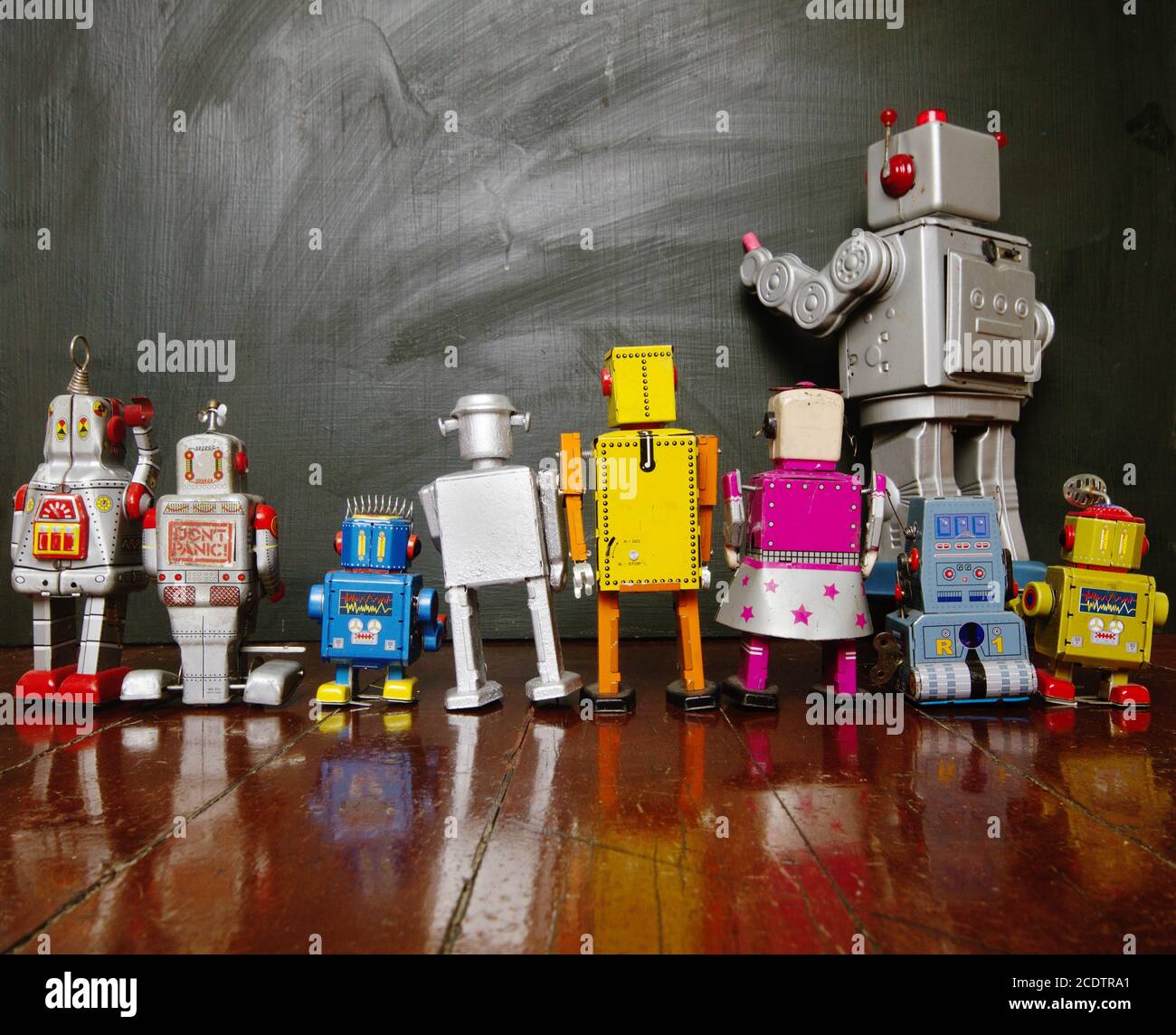 Big silver robot toy teaches his class Stock Photo - Alamy
