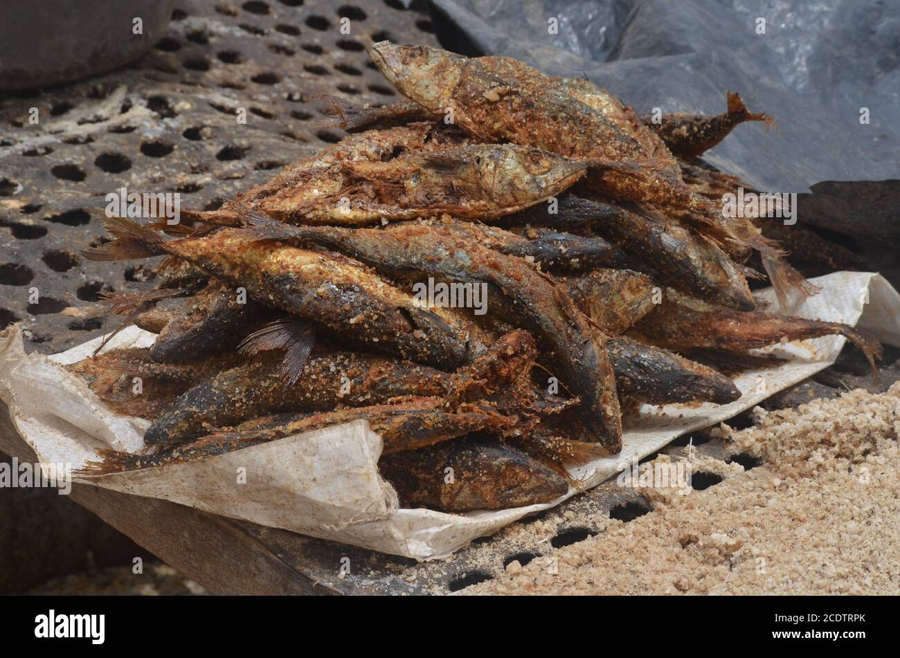 Racks of sun-dried (guédj), salted and/or smoked fish (kétiakh) in ...