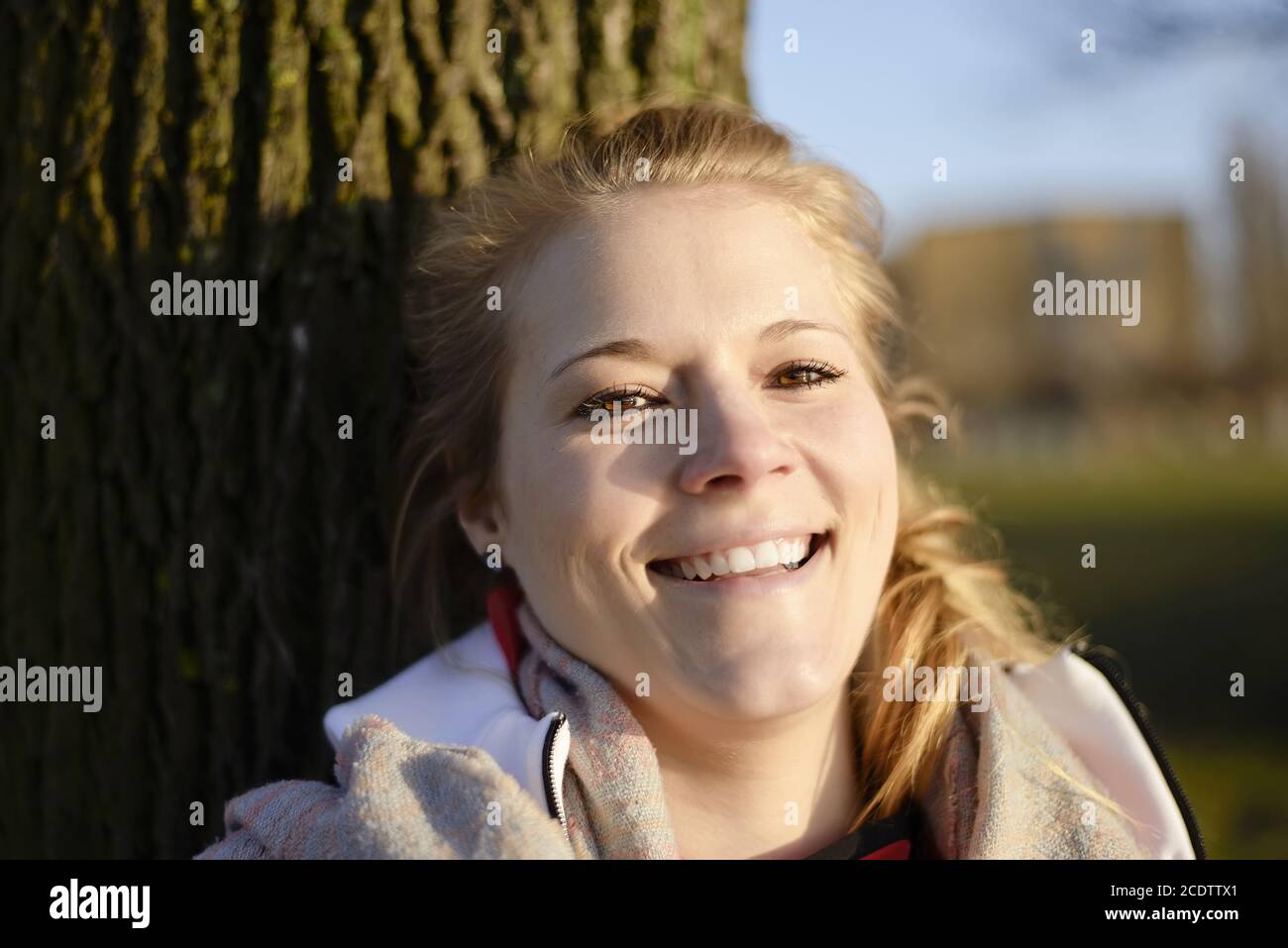 young woman in spring sun Stock Photo - Alamy