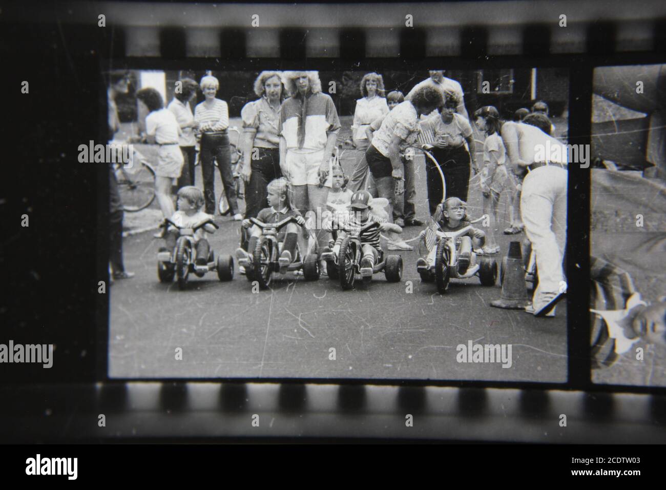 Fine 1970s vintage black and white photography of a street race of kids ...