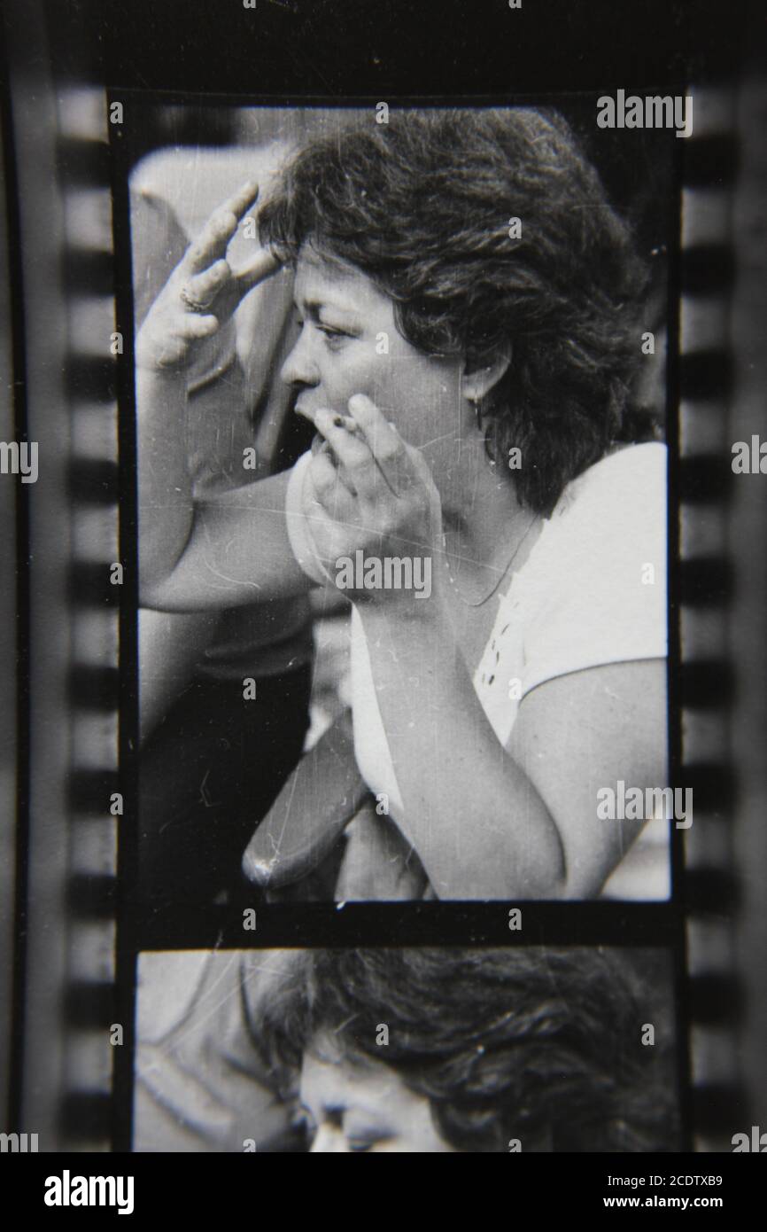 Fine 1970s vintage black and white photography of a woman smoking a ...