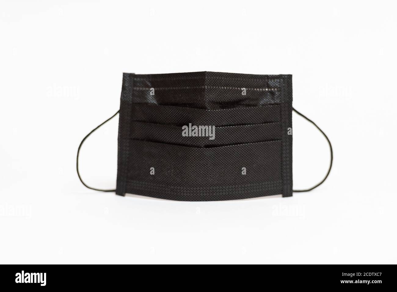 Black surgical mask for protection against Coronavirus (COVID-19) and ...