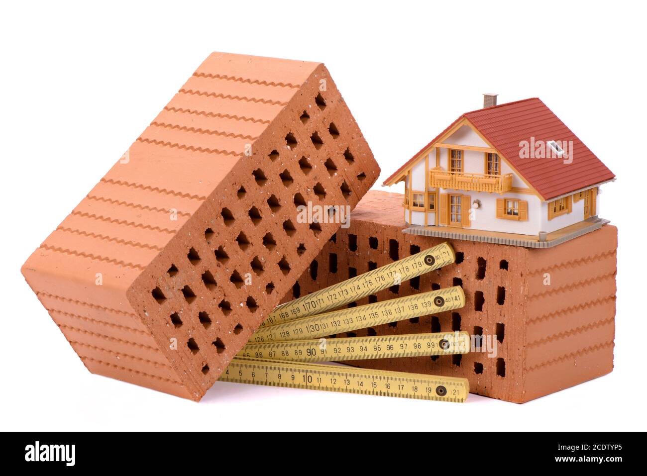 house construction with brick, tools, plan and model house Stock Photo ...