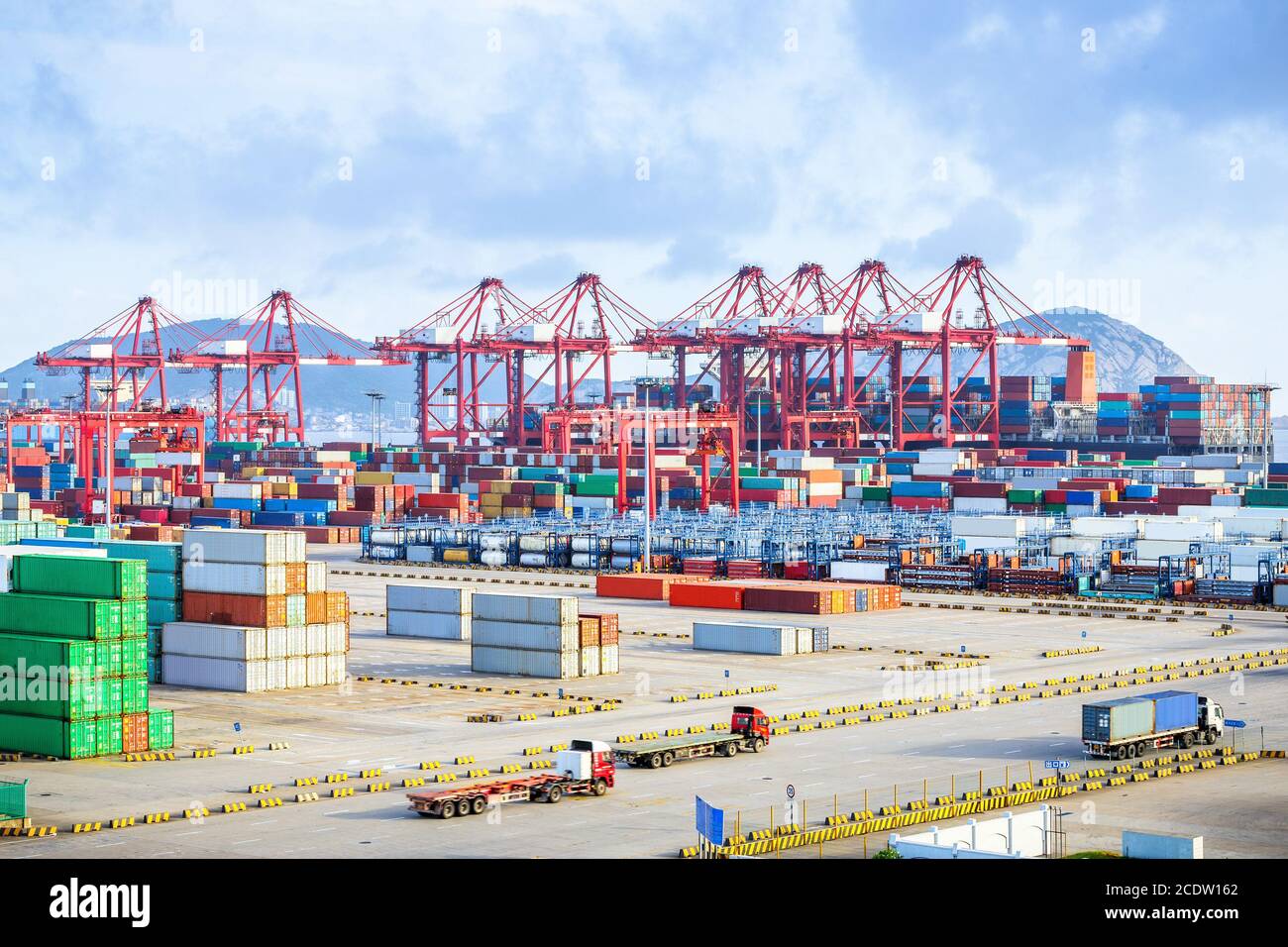 busy harbour with full loads of containers Stock Photo - Alamy