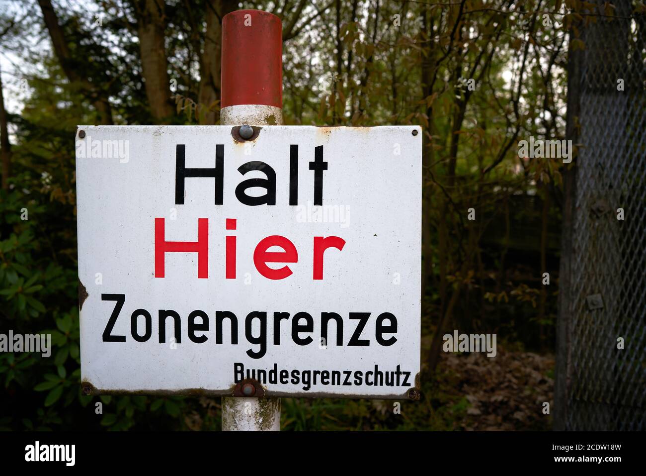 Sign on the former inner German border with the inscription stop here ...