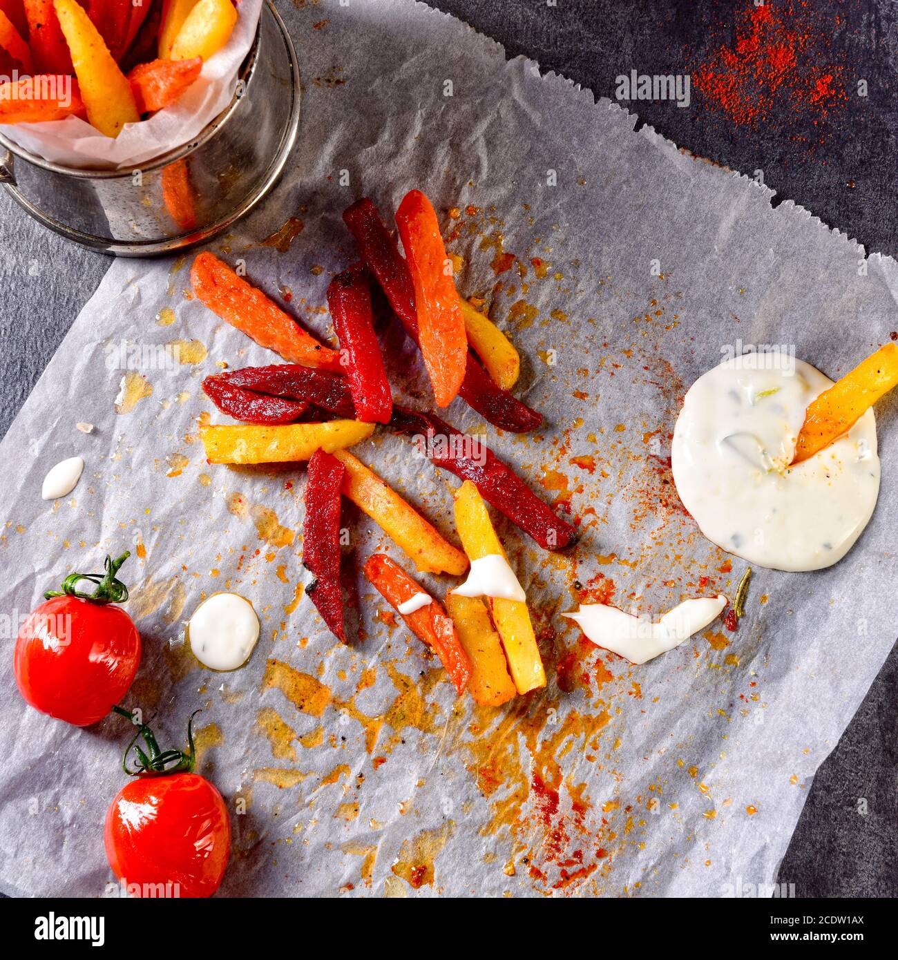 vegetable French fries with herb quark and tomatoes Stock Photo - Alamy