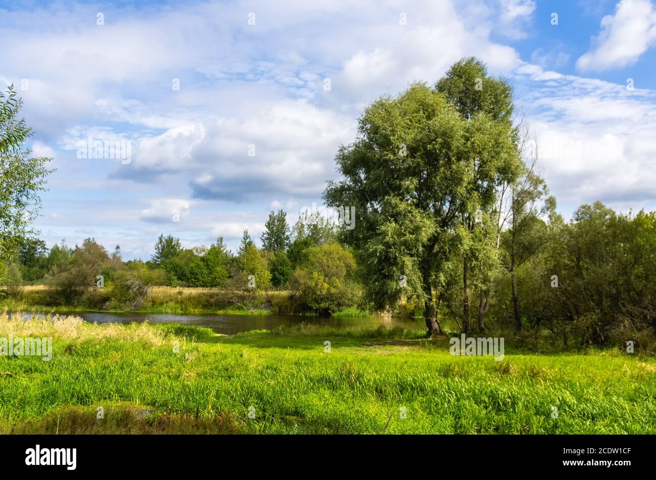 Colorful riverside ladscape Stock Photo - Alamy