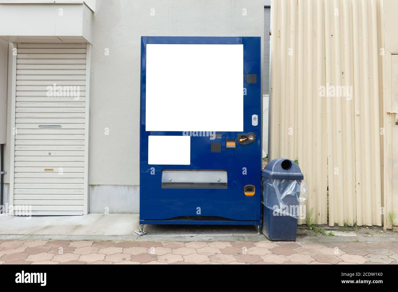 Empty white shelves of standard office vending machine Stock Photo - Alamy