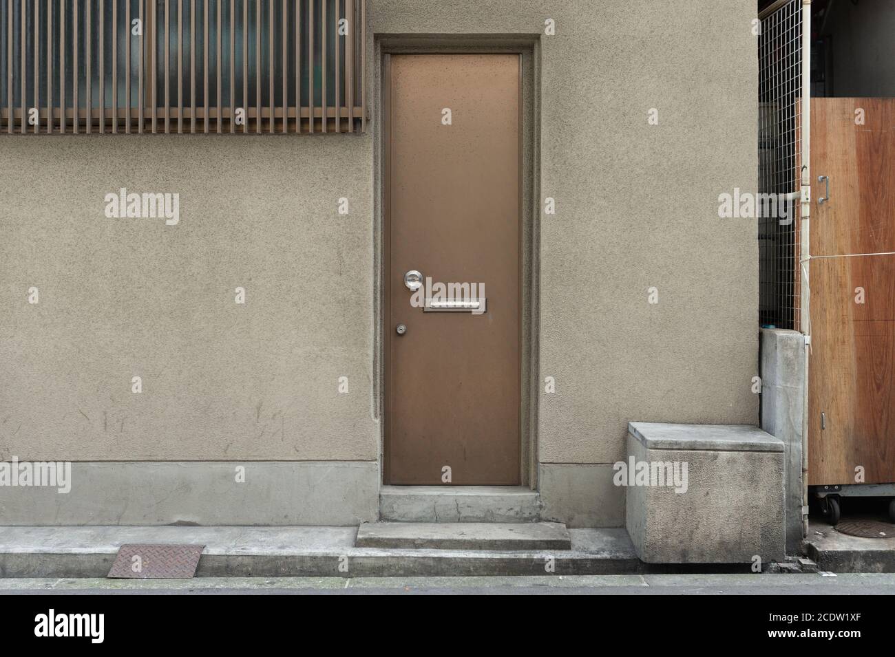 sidewalk by street wall & door Stock Photo - Alamy