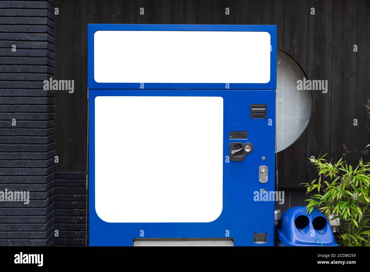 Empty white shelves of standard office vending machine Stock Photo - Alamy